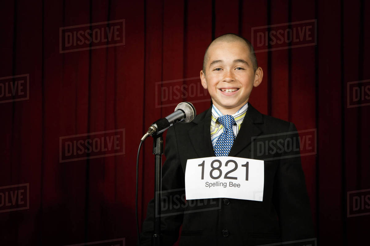 Boy wearing number on stage - Stock Photo - Dissolve
