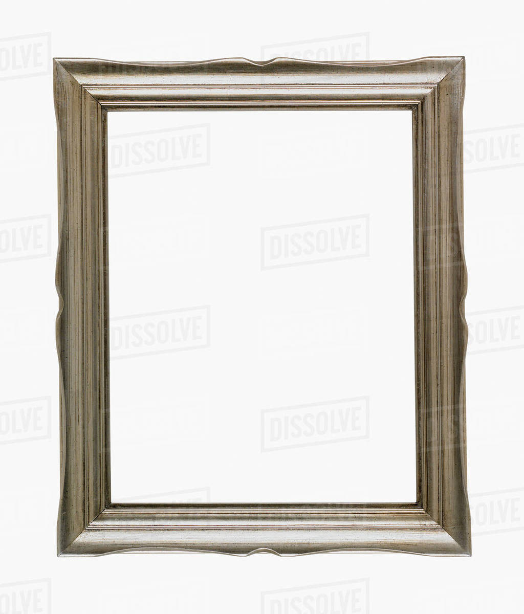 Studio shot of empty picture frame - Stock Photo - Dissolve