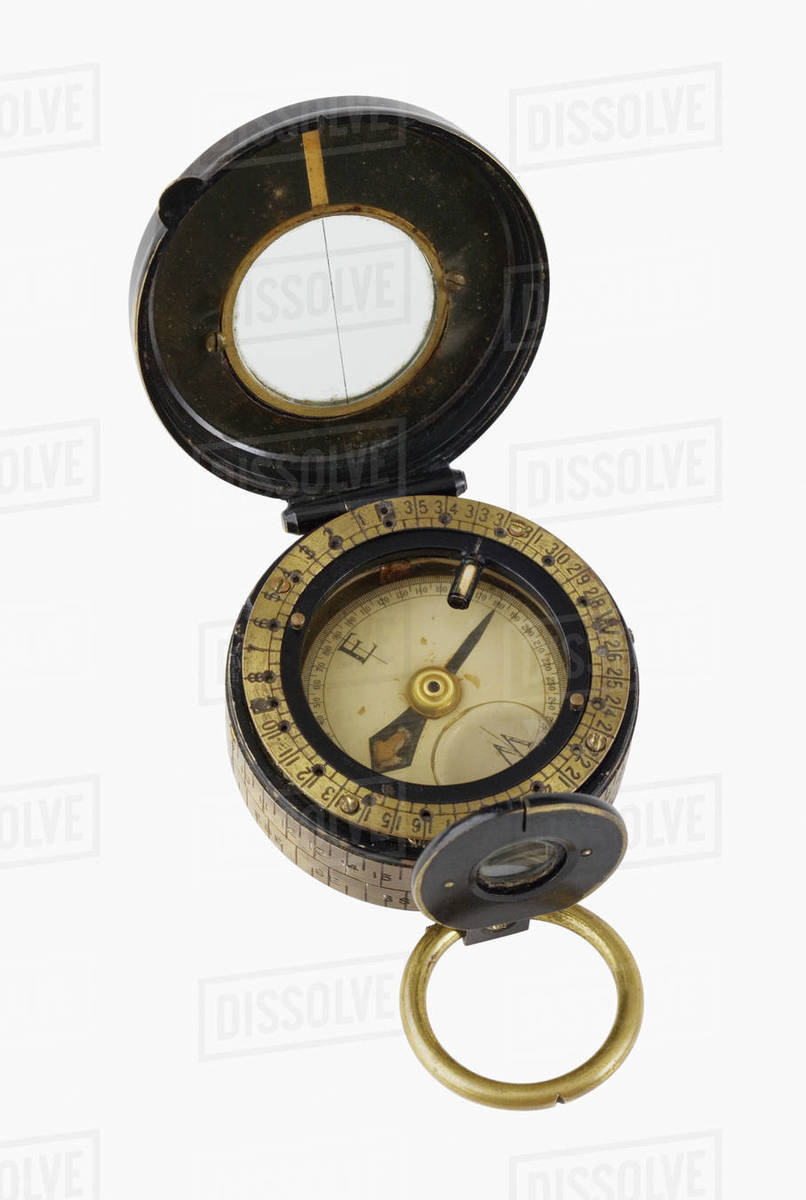 Close up of old fashioned compass - Stock Photo - Dissolve