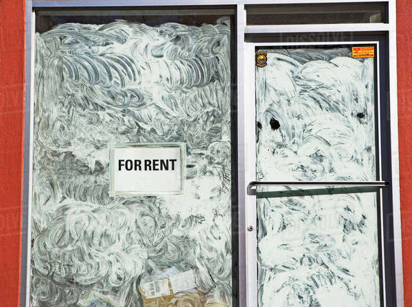 For Rent sign on store window - Stock Photo - Dissolve