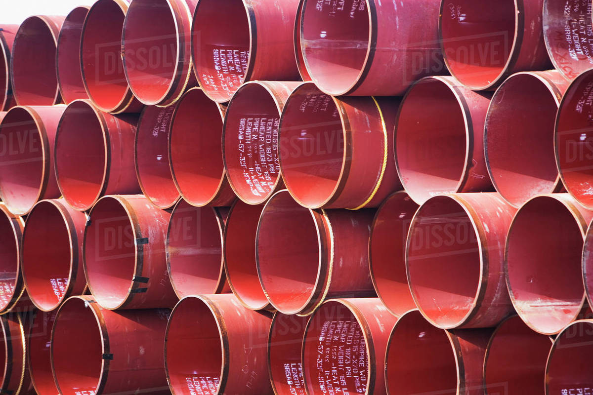 Stack of large pipes - Stock Photo - Dissolve