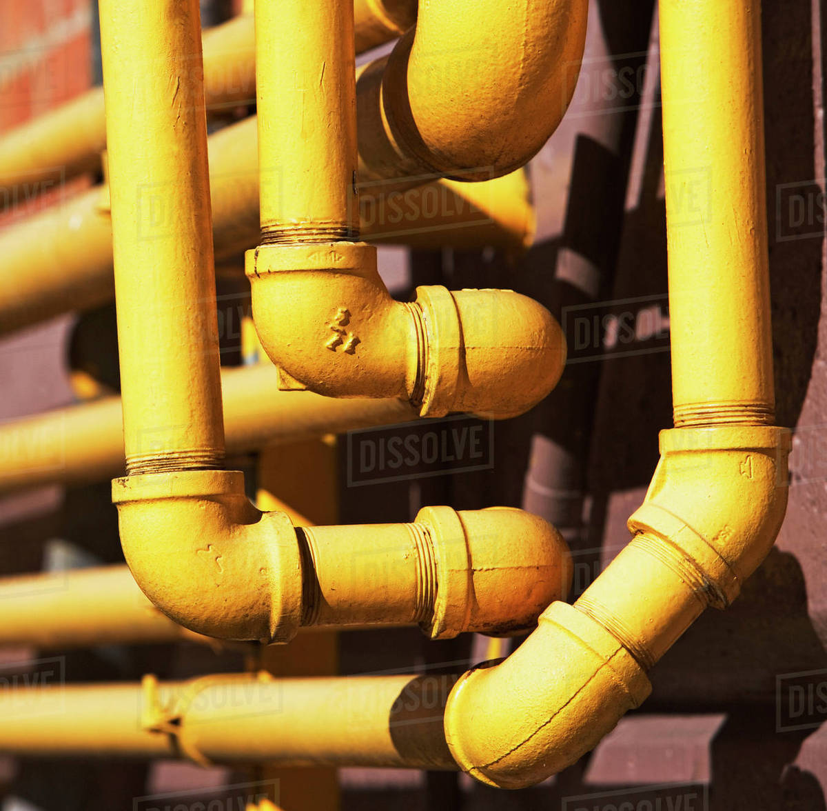 Close up of pipes on building - Royalty-free Stock Photo | Dissolve