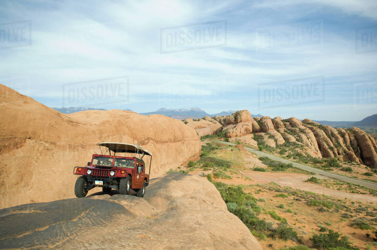 Off-road vehicle driving on rock formation - Royalty-free Stock Photo ...