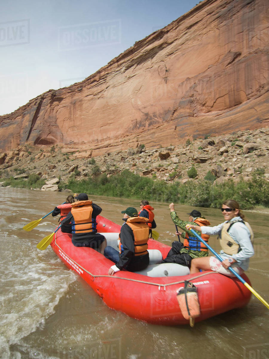 Group of people river rafting - Royalty-free Stock Photo | Dissolve
