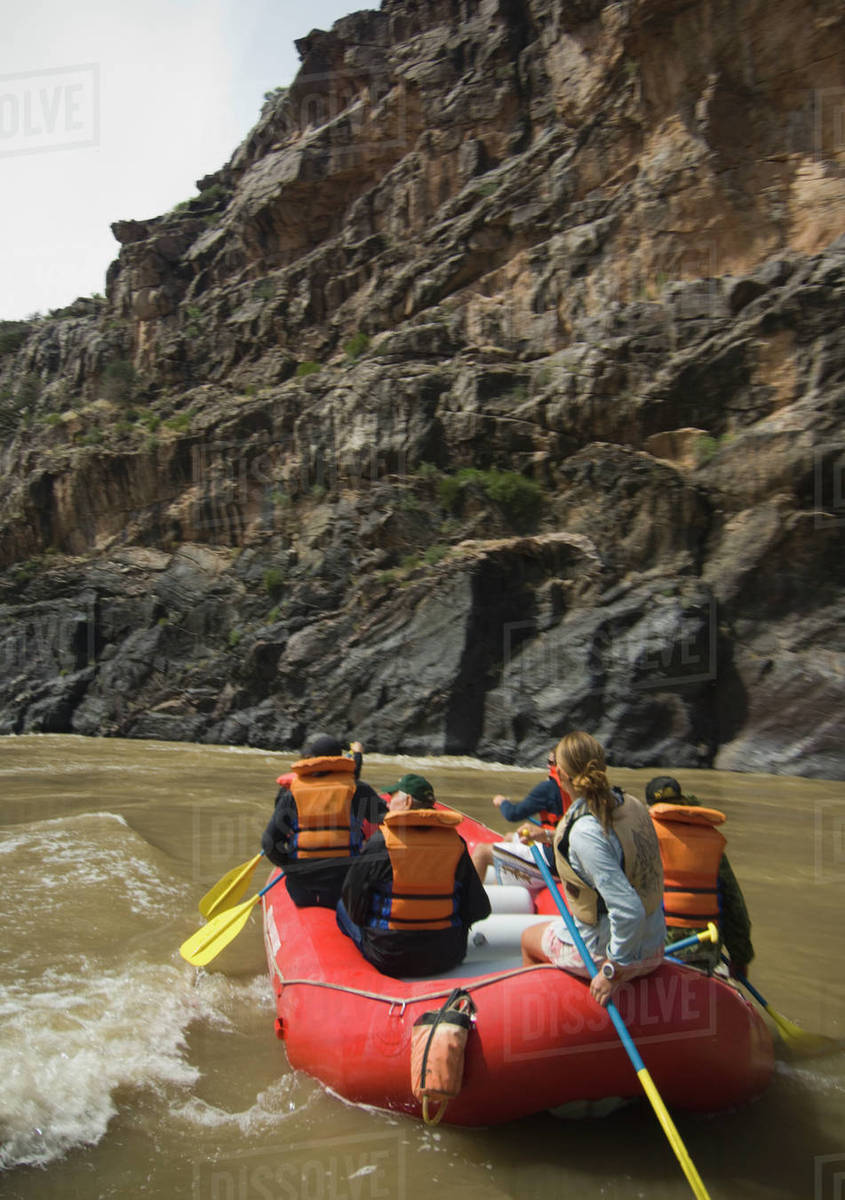 Group of people river rafting - Royalty-free Stock Photo | Dissolve