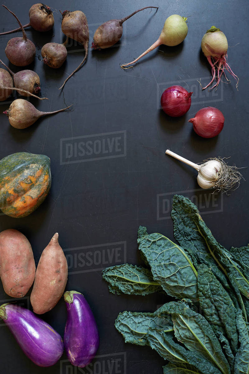 Vegetables on dark surface - Royalty-free Stock Photo | Dissolve