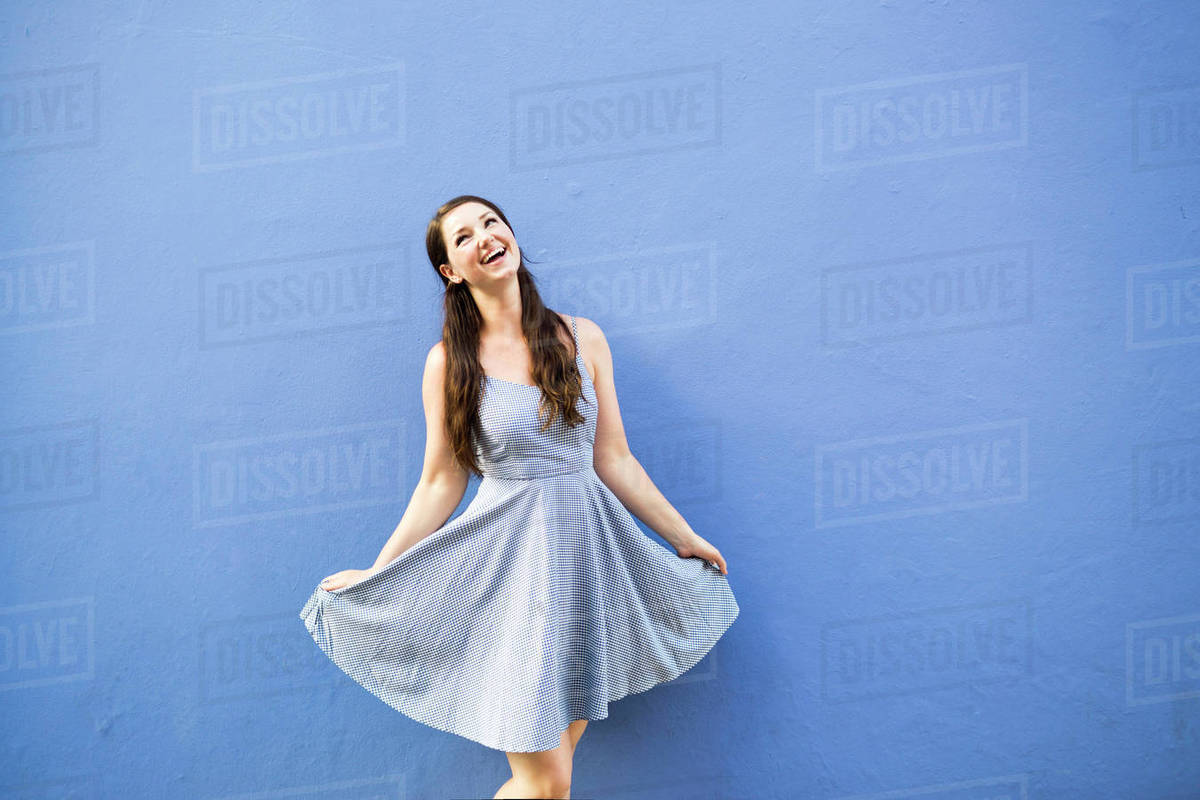 Beautiful happy woman dancing - Royalty-free Stock Photo | Dissolve