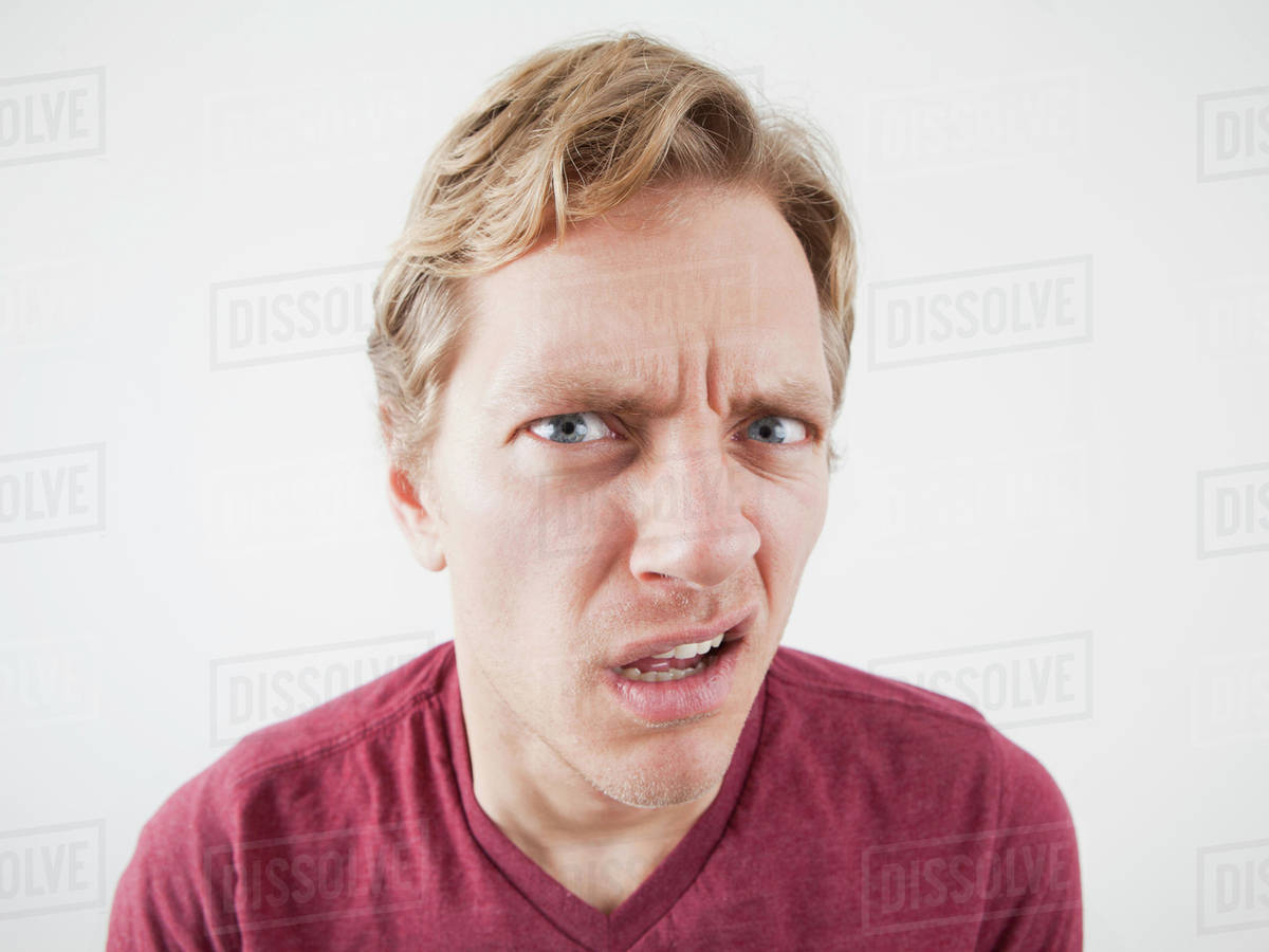 Studio Shot of mid adult man expressing anger - Royalty-free Stock ...