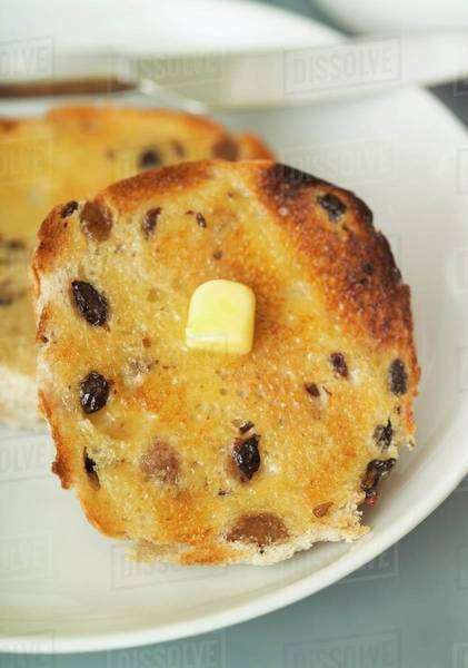 Toasted bun with butter - Royalty-free Stock Photo | Dissolve