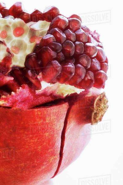 Opened pomegranate, close-up - Royalty-free Stock Photo | Dissolve