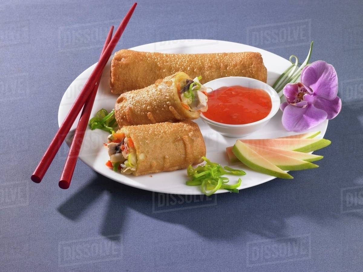Spring rolls with chilli sauce - Stock Photo - Dissolve
