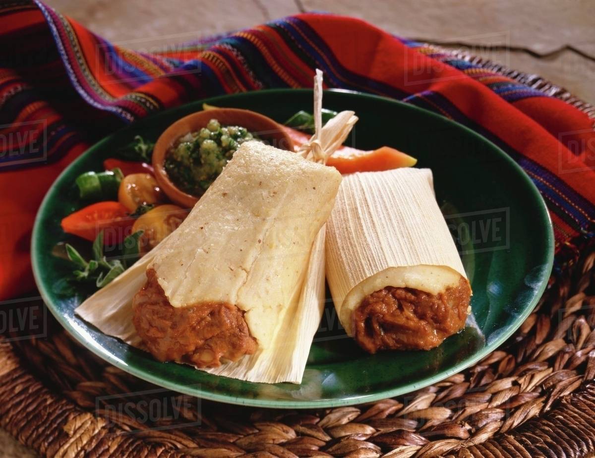 Tamale in Husk on a Plate - Royalty-free Stock Photo | Dissolve