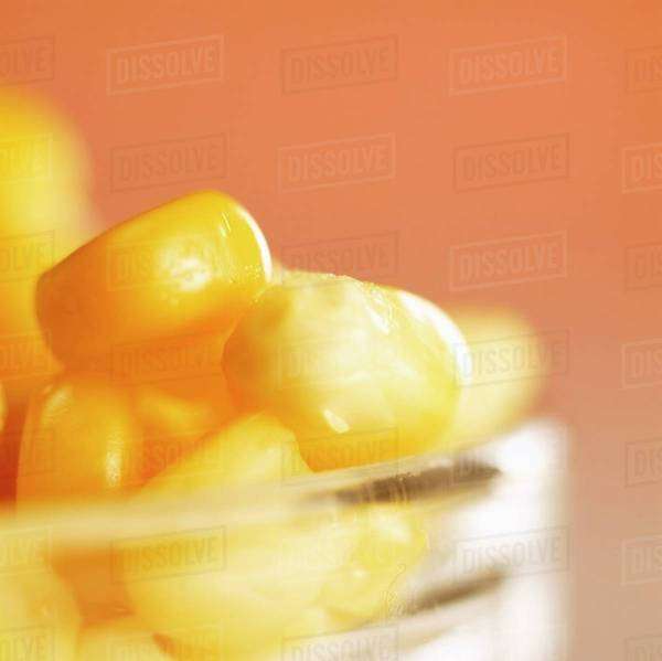 Sweetcorn kernels in a small glass bowl - Royalty-free Stock Photo ...