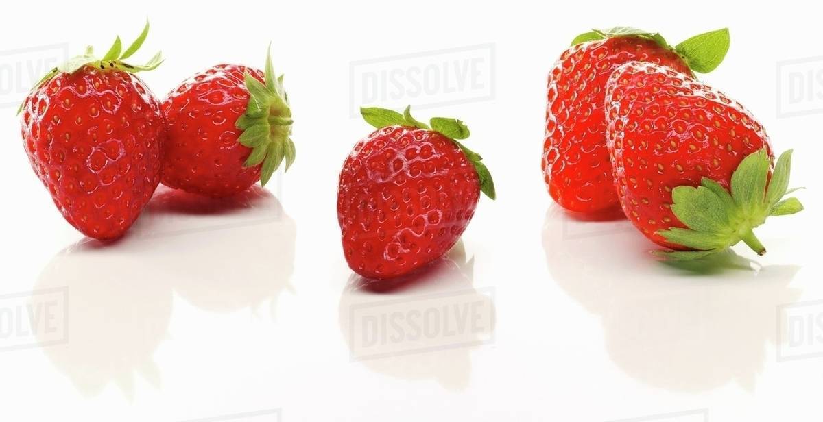 Five fresh strawberries - Royalty-free Stock Photo | Dissolve