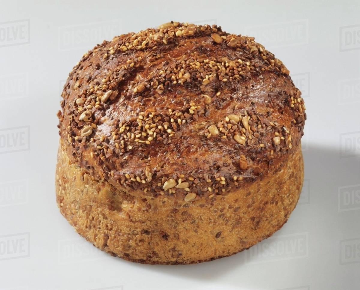 Round multigrain bread - Royalty-free Stock Photo | Dissolve
