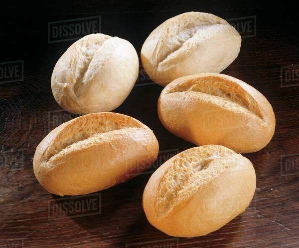Five fresh bread rolls - Royalty-free Stock Photo | Dissolve