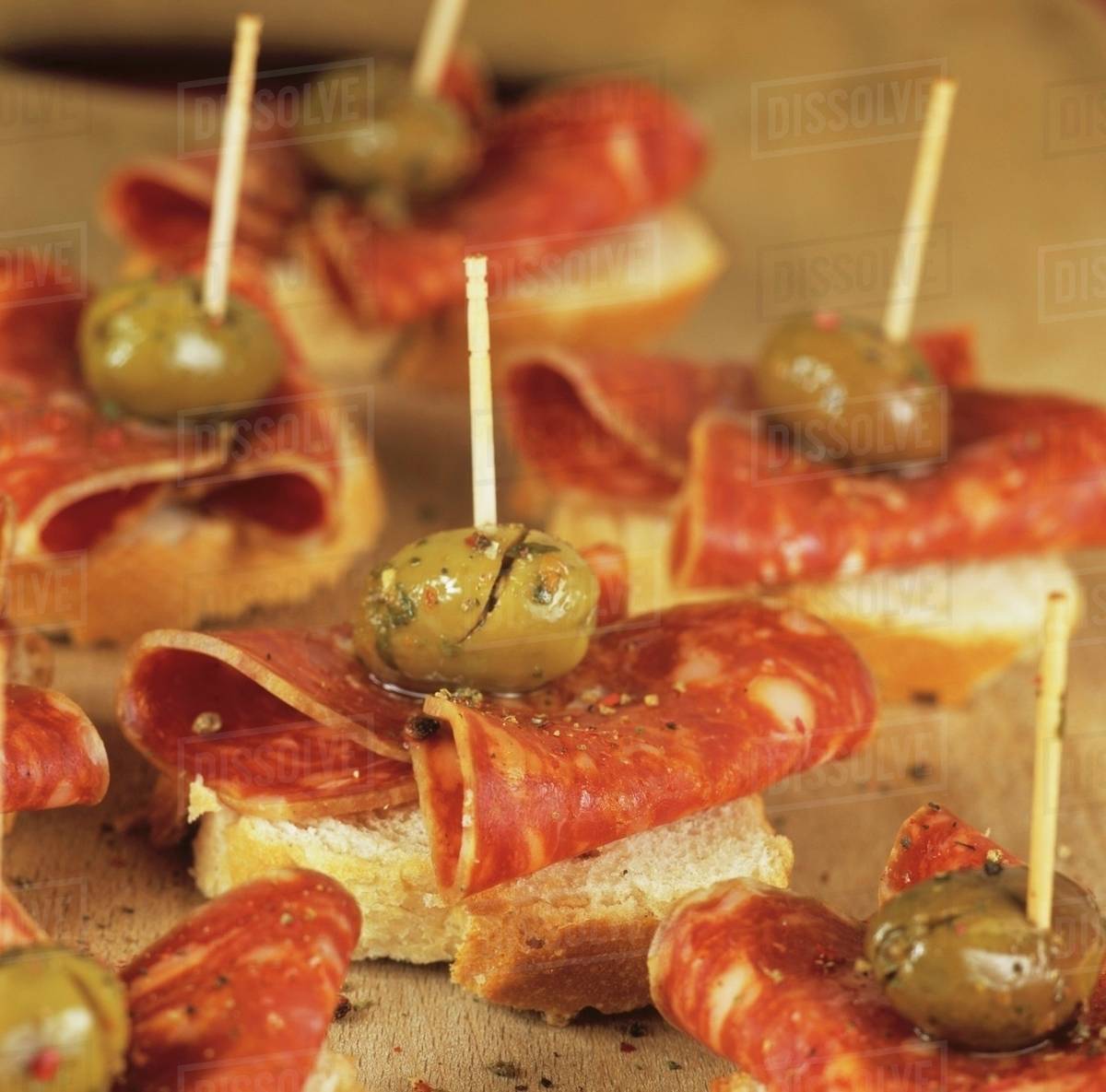 Canapes with chorizo and green olives - Royalty-free Stock Photo | Dissolve