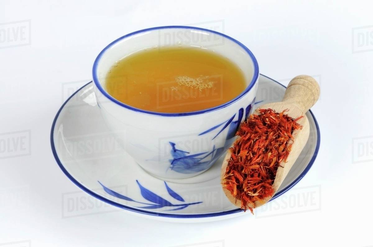 Safflower petal tea - Royalty-free Stock Photo | Dissolve