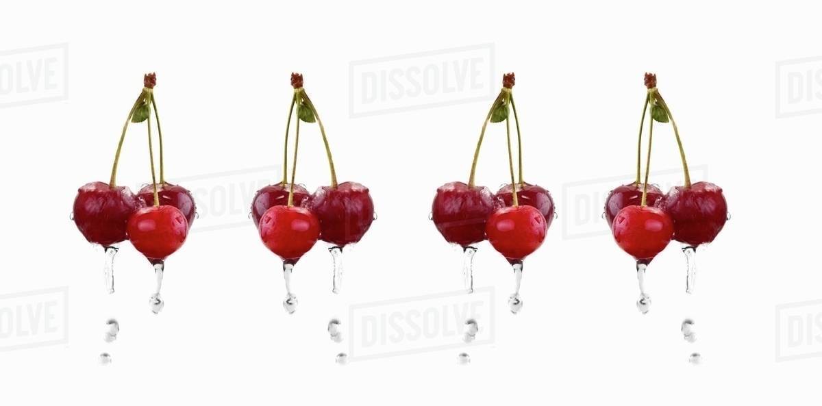 Water dripping from cherries - Royalty-free Stock Photo | Dissolve