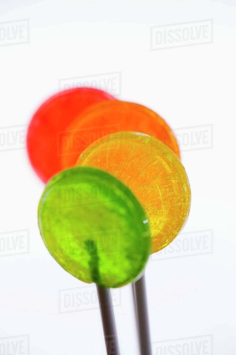 Four coloured lollipops - Royalty-free Stock Photo | Dissolve