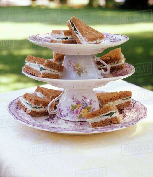 Sandwiches on tiered stand made with upturned cups - Royalty-free Stock ...