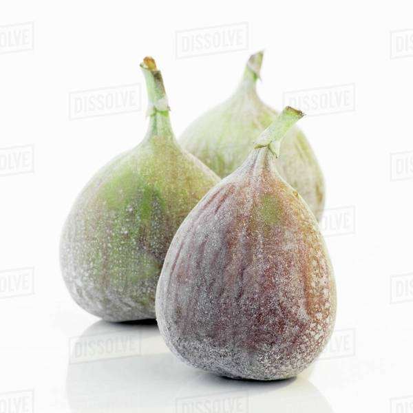 Three fresh figs - Stock Photo - Dissolve