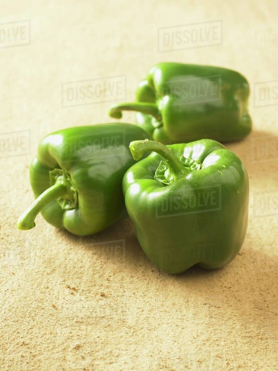 Three green peppers - Royalty-free Stock Photo | Dissolve