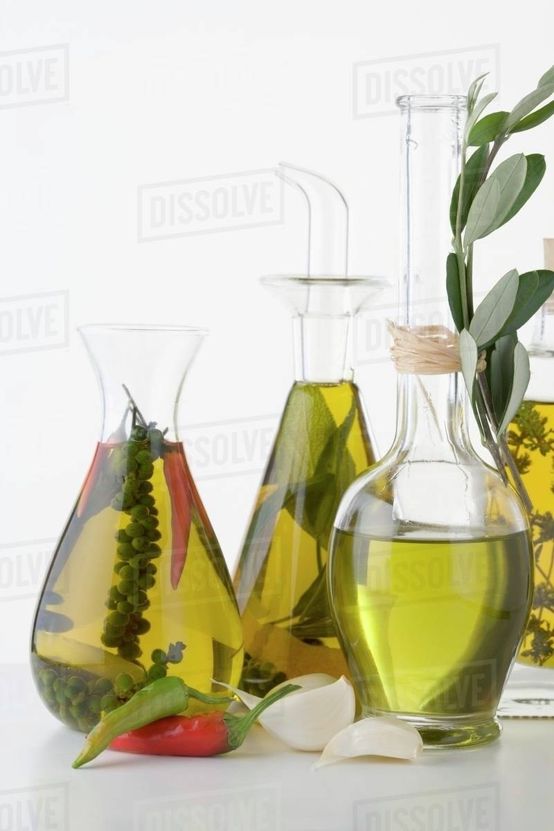 Various herb and spice oils - Royalty-free Stock Photo | Dissolve