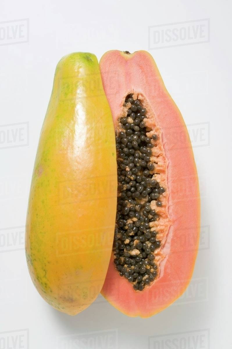 Papaya, halved - Stock Photo - Dissolve