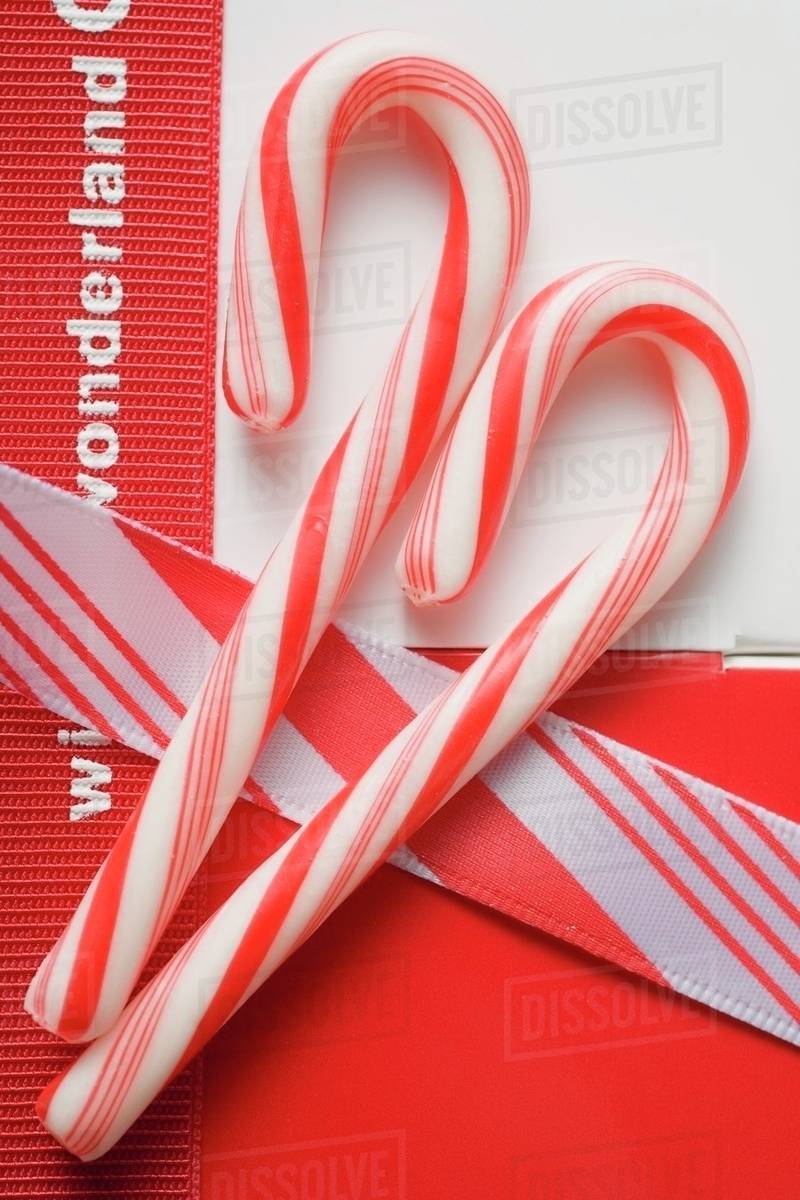 Two candy canes for Christmas - Stock Photo - Dissolve