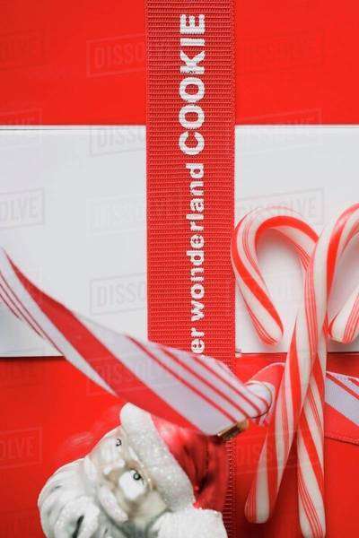 Christmas parcel with candy canes & Christmas tree ornament - Royalty ...