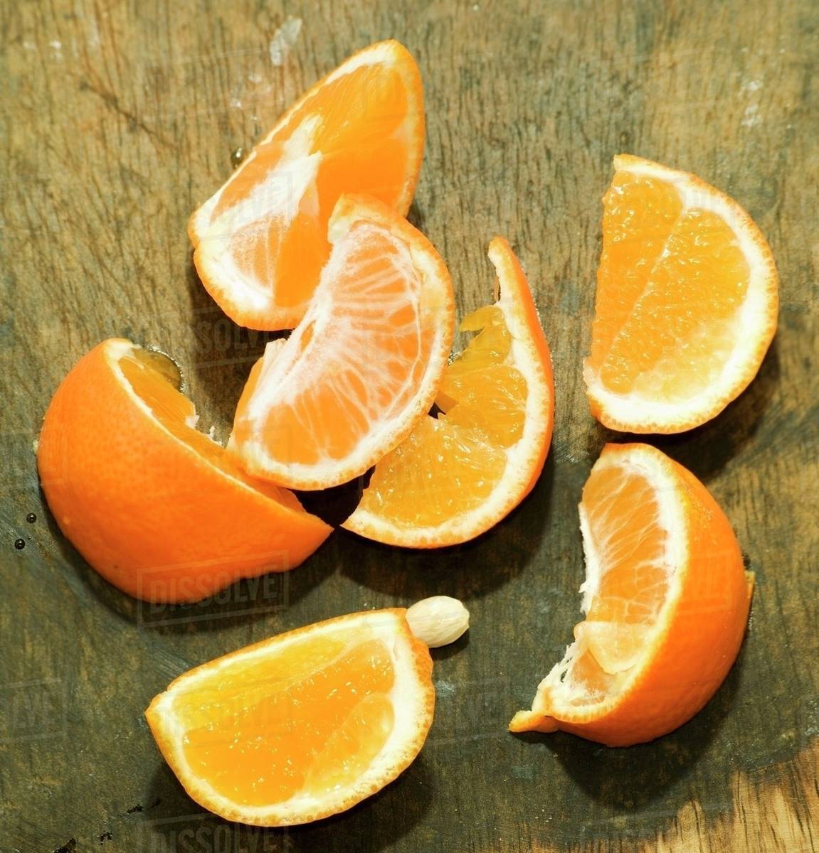 A sliced mandarin - Stock Photo - Dissolve