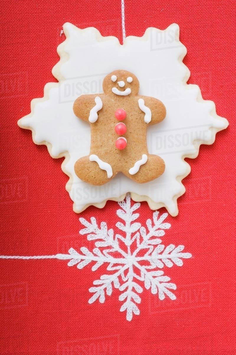 Gingerbread man on star biscuit - Royalty-free Stock Photo | Dissolve