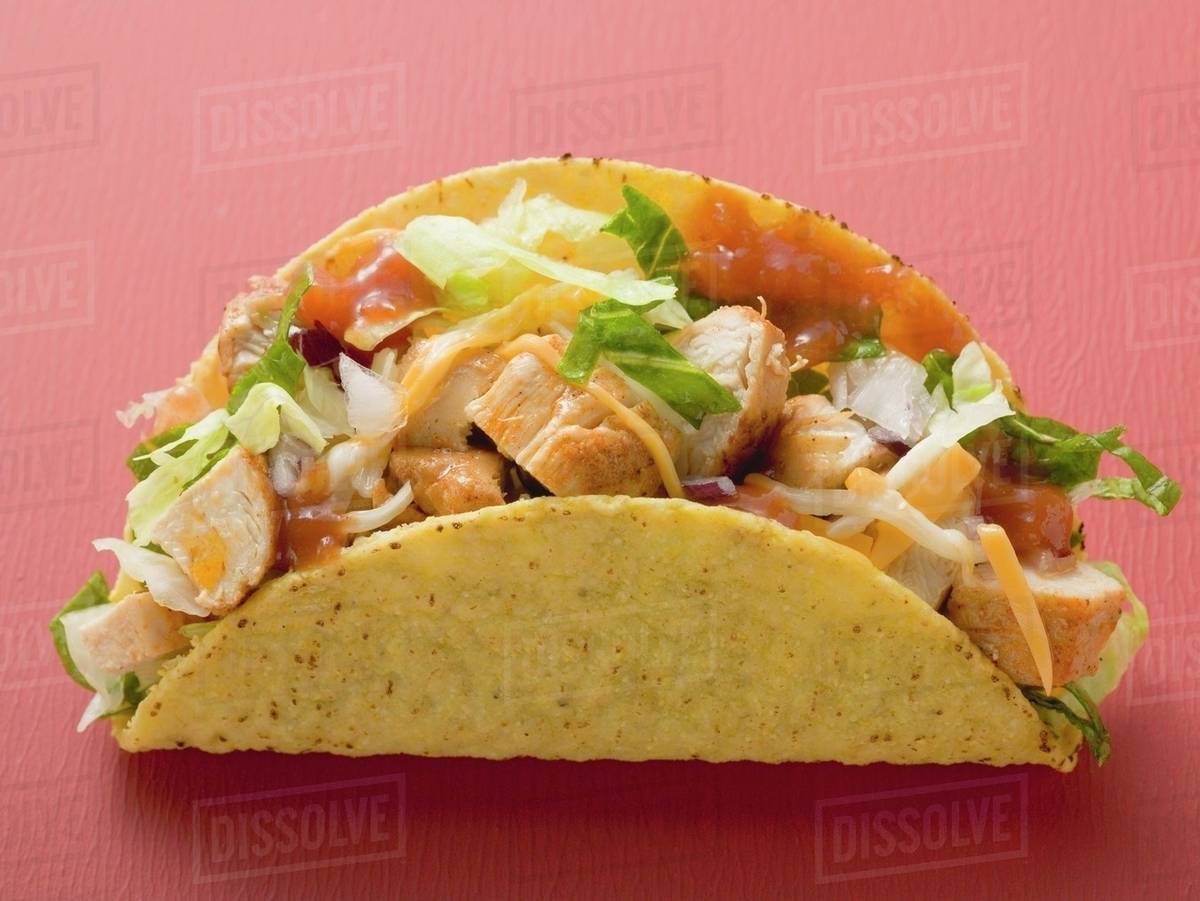 Chicken taco (red background) - Stock Photo - Dissolve