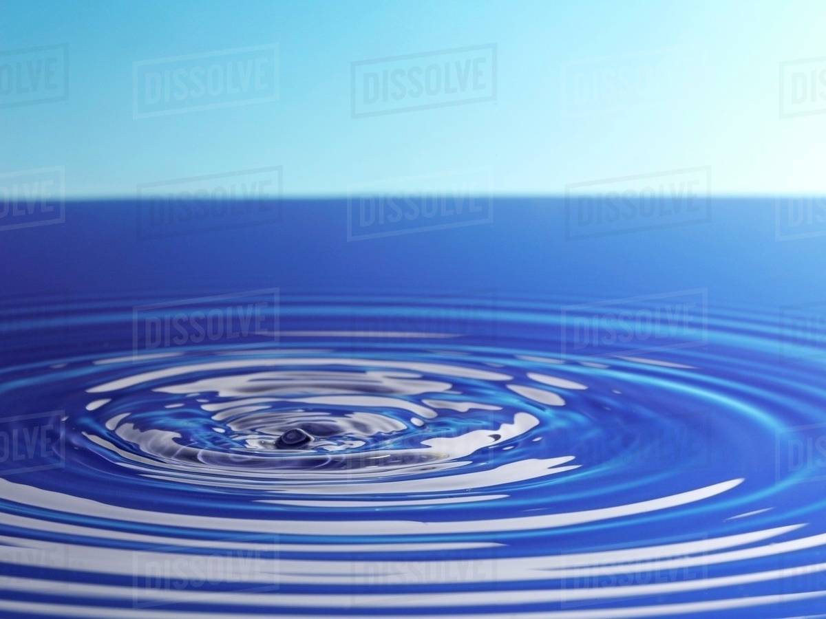 Concentric ripples in water - Stock Photo - Dissolve