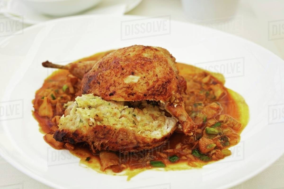 Stuffed spring chicken with chanterelle mushrooms - Royalty-free Stock ...