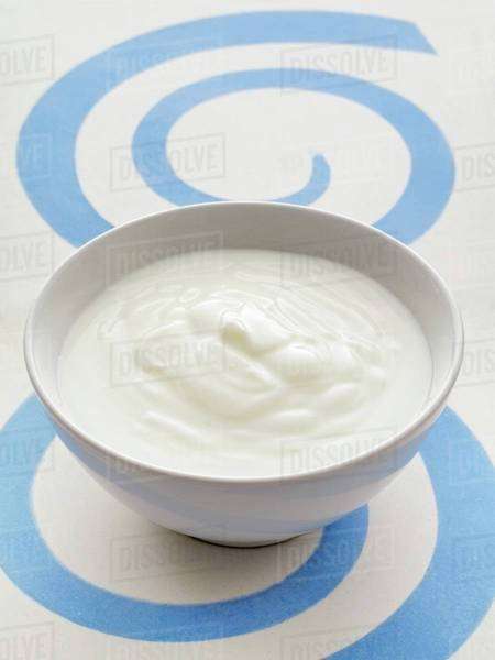 Yogurt in a ceramic bowl - Royalty-free Stock Photo | Dissolve