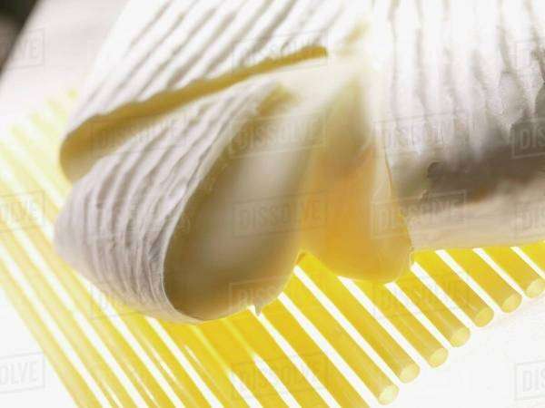 Brie, sliced (close-up) - Royalty-free Stock Photo | Dissolve