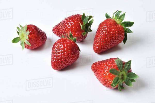 Five strawberries - Royalty-free Stock Photo | Dissolve