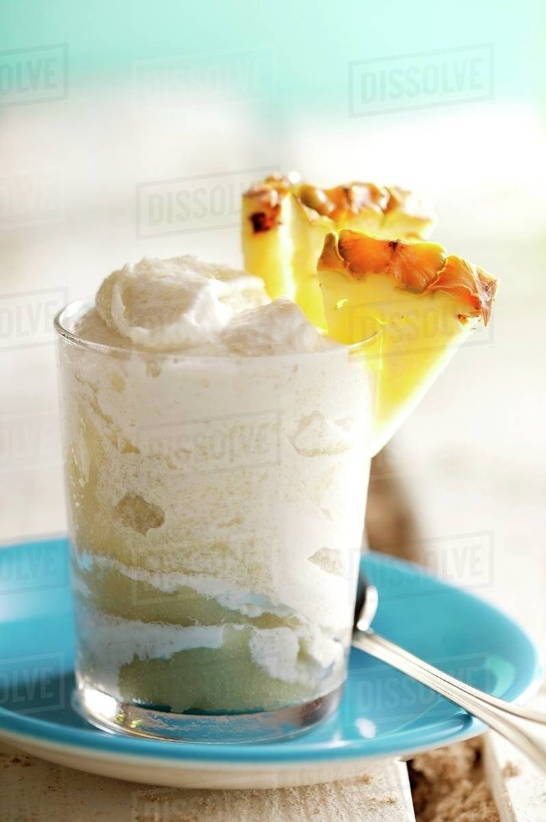 Guava fool with a pineapple garnish - Royalty-free Stock Photo | Dissolve