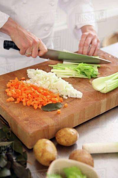 A chef dicing vegetables - Royalty-free Stock Photo | Dissolve