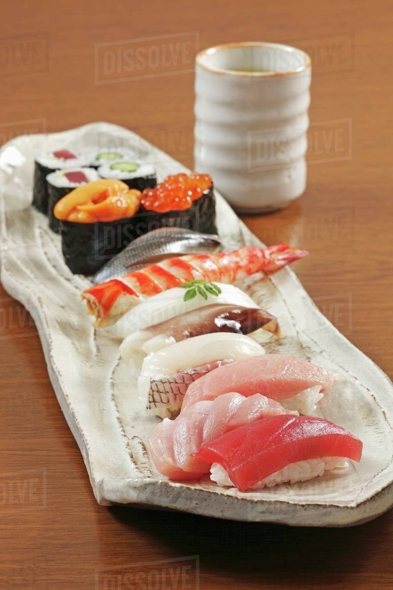 Hand-rolled nigiri and maki sushi - Royalty-free Stock Photo | Dissolve