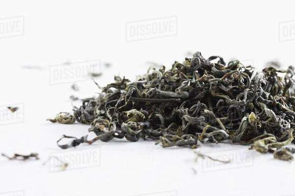 Tea on a white surface - Stock Photo - Dissolve