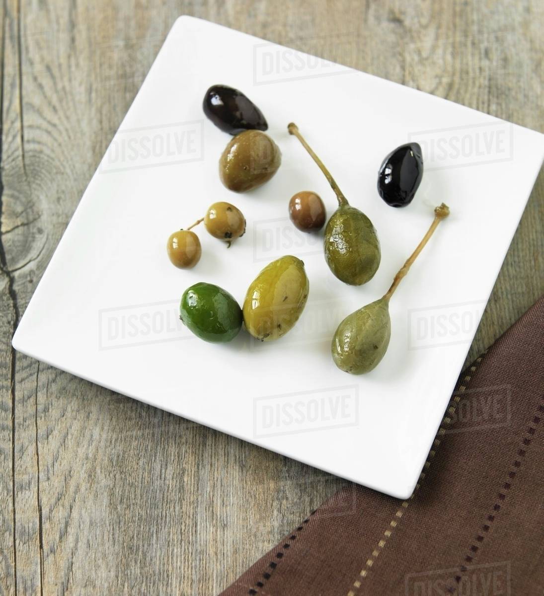 An Assortment of Olives on a White Plate - Royalty-free Stock Photo ...