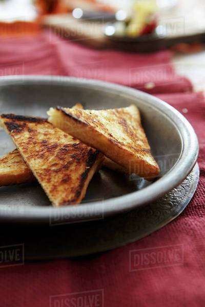 Triangles of fried bread - Royalty-free Stock Photo | Dissolve