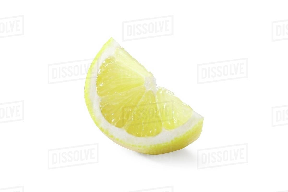 A wedge of lemon - Stock Photo - Dissolve