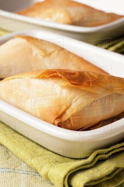 Filo pastry parcels with a spinach and feta filling - Stock Photo ...