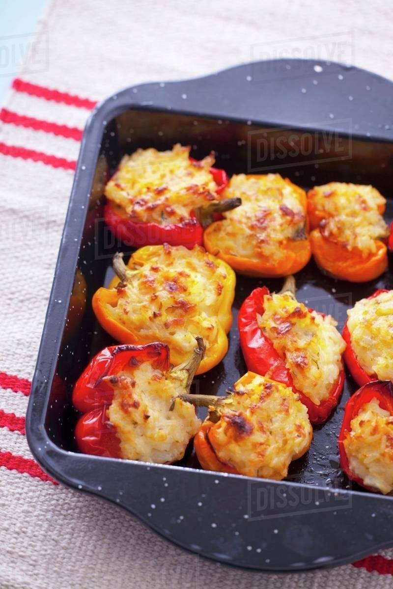 Red peppers stuffed with rice and cheese - Royalty-free Stock Photo ...