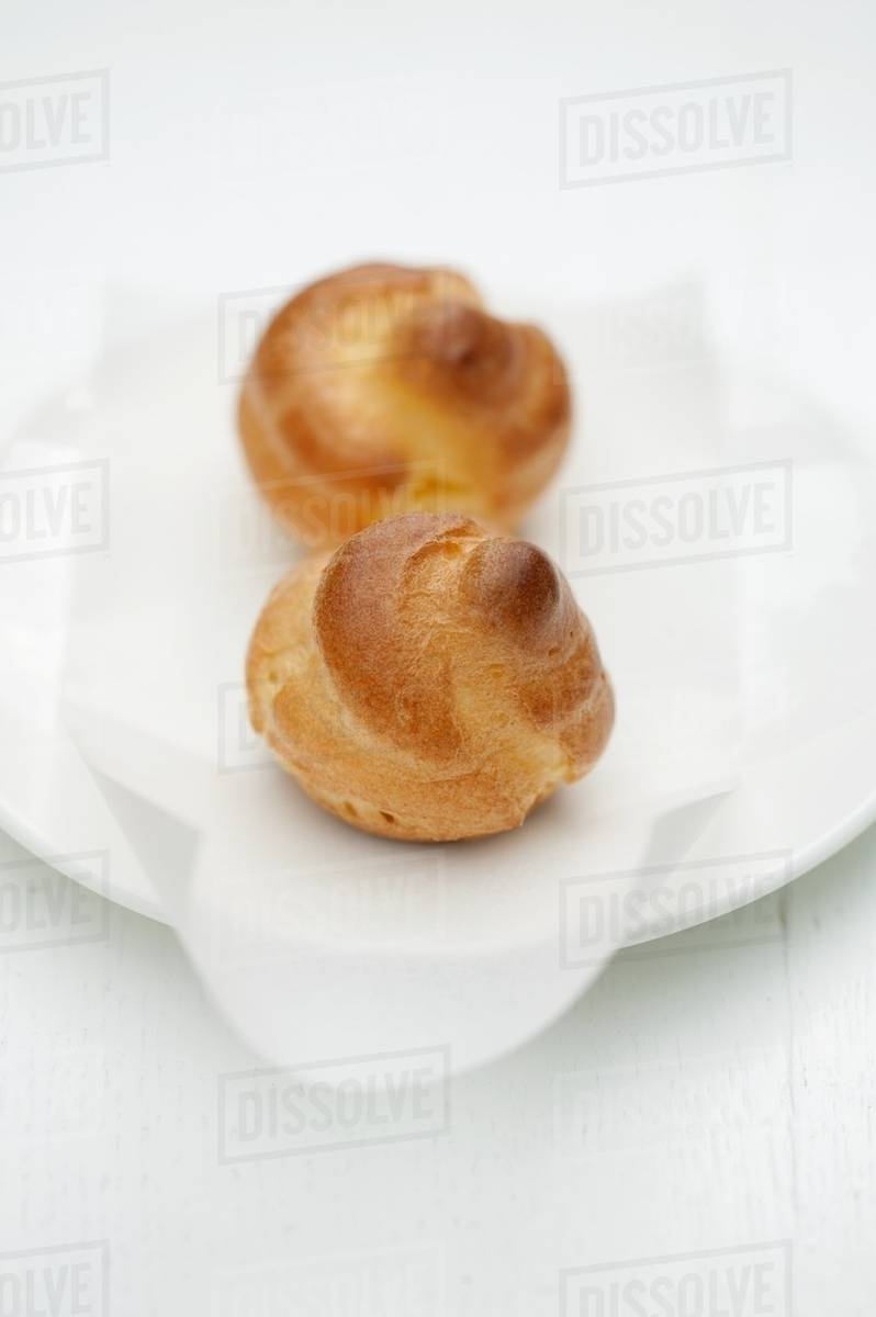Mini cream puffs - Stock Photo - Dissolve
