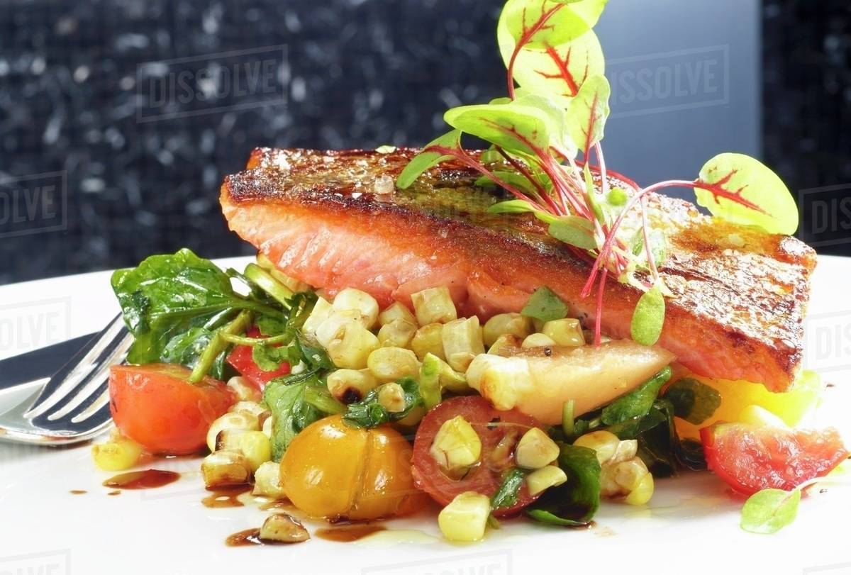 Salmon fillet with a side of vegetables - Royalty-free Stock Photo ...